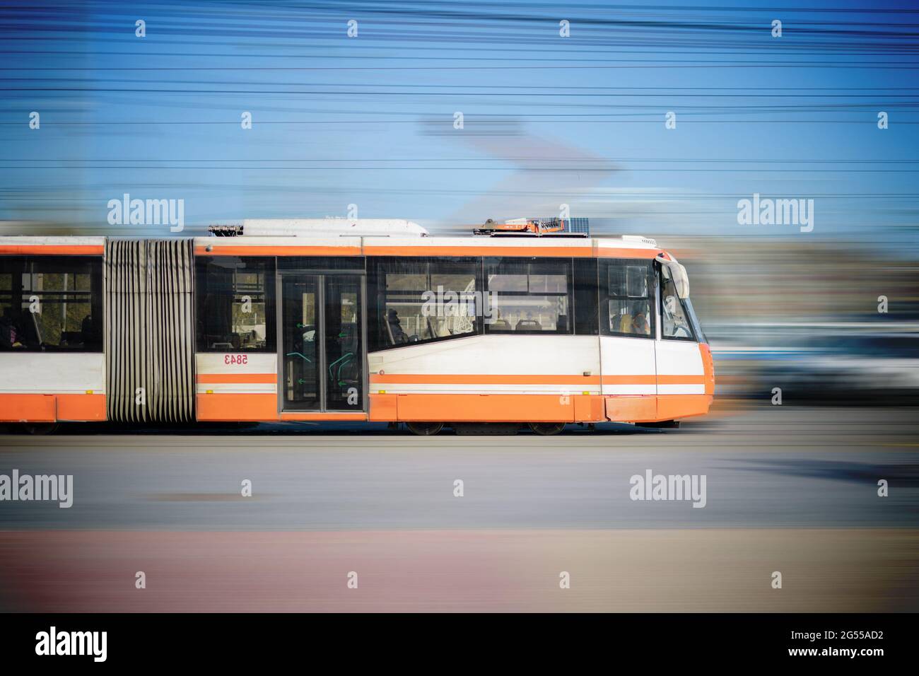the motion blur of the public city tram or train Stock Photo - Alamy