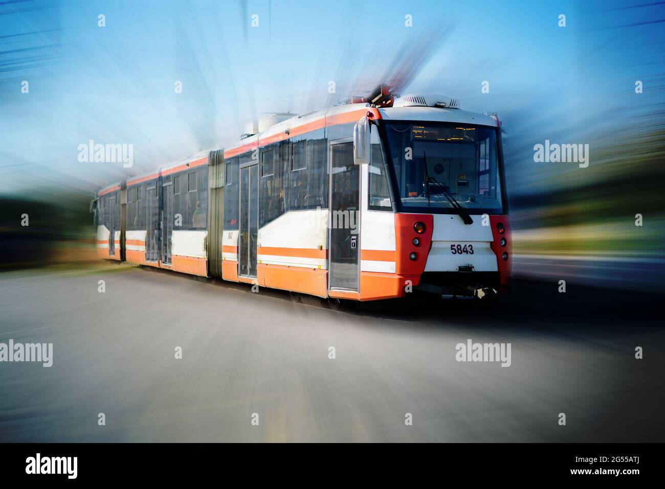 the motion blur of the public city tram or train Stock Photo - Alamy