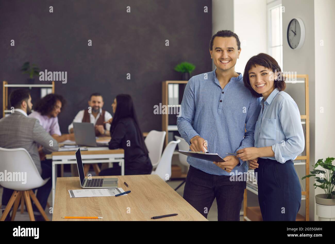 Happy work environment hi-res stock photography and images - Alamy