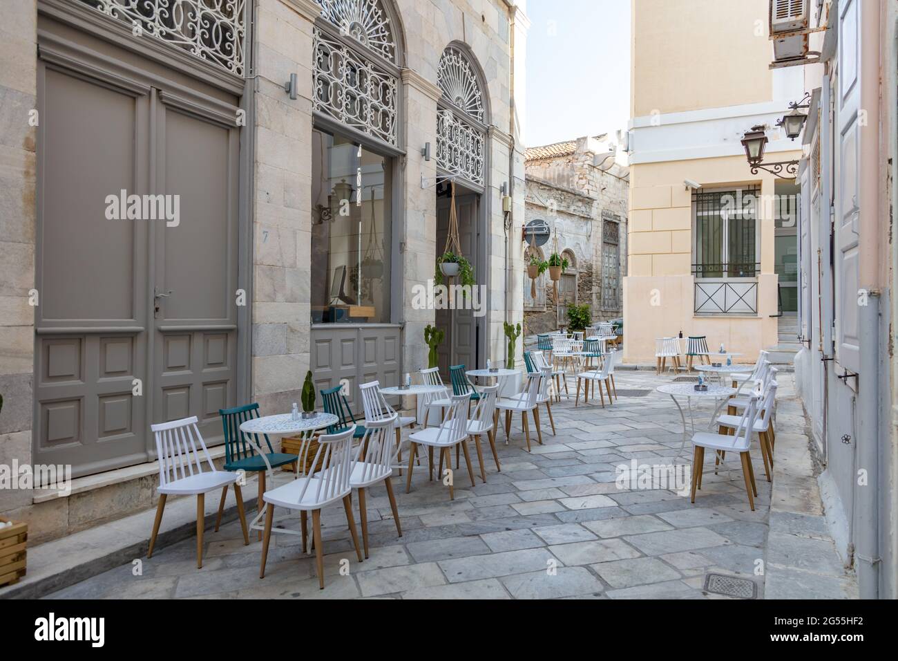 Coffee break time at Ermoupolis Syros island, Cyclades, Greece. View of ...