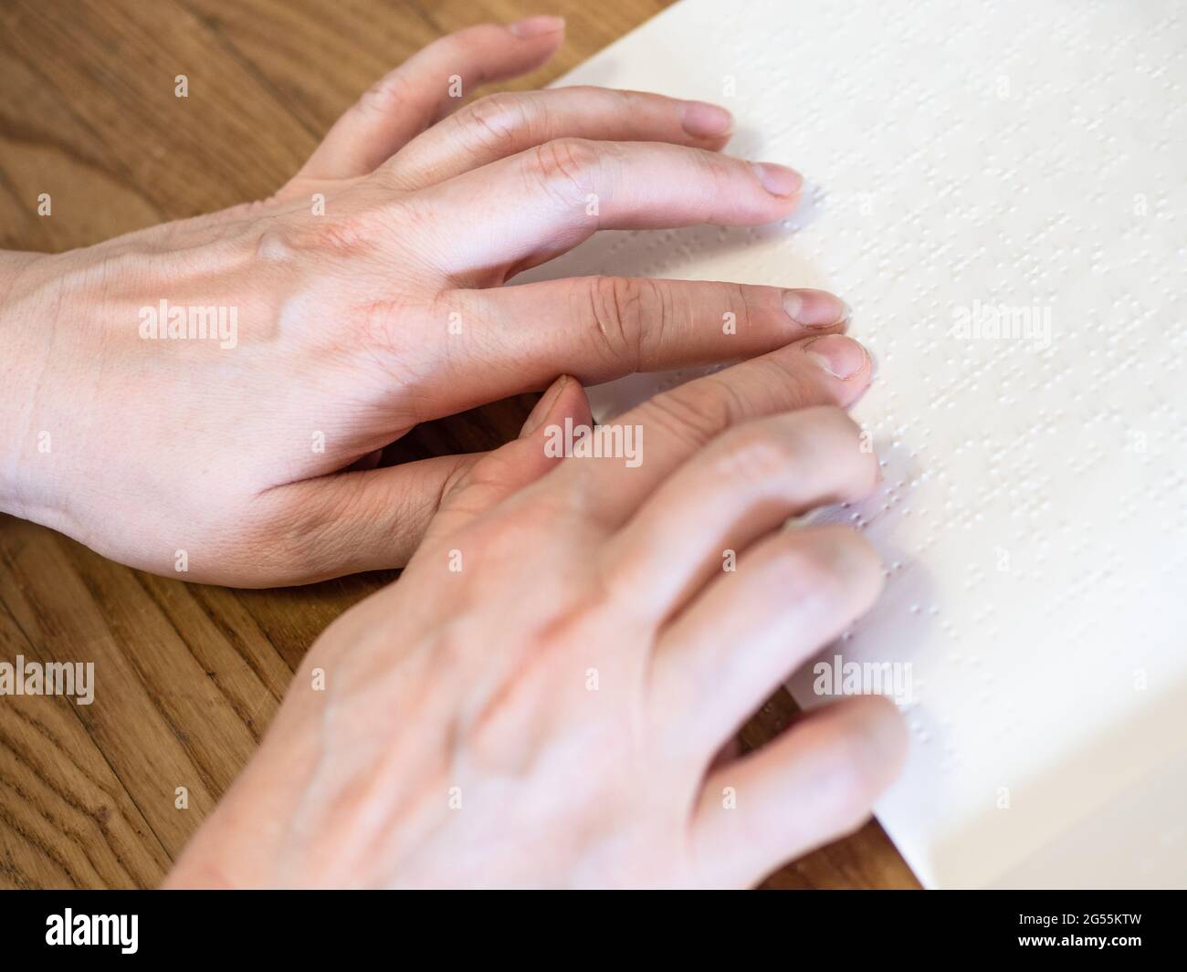 Hands reading braille book hi-res stock photography and images - Alamy Hands reading braille book hi-res stock photography and images - Alamy