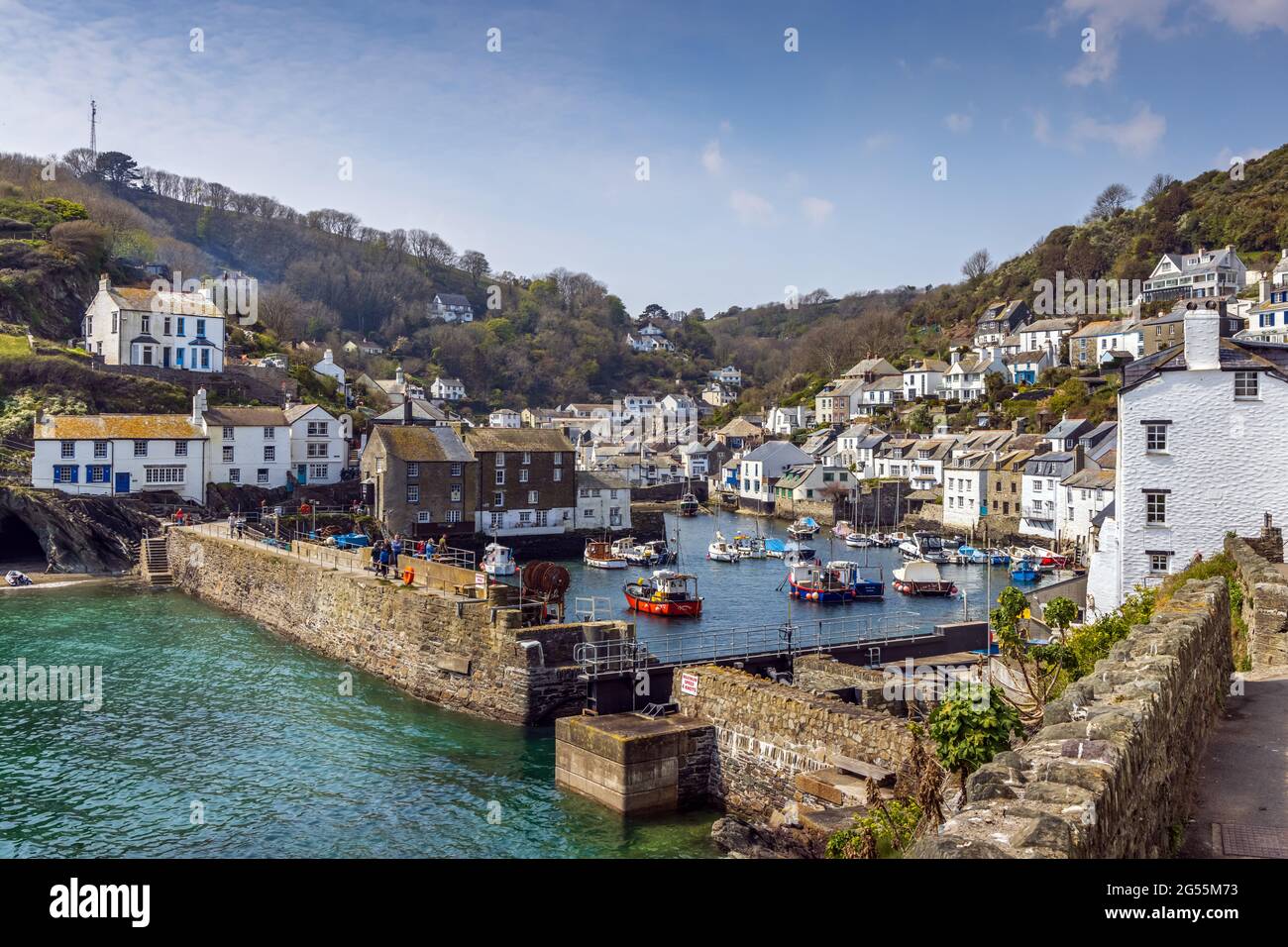 Boats moored in the inner harbour at Polperro, a charming and ...