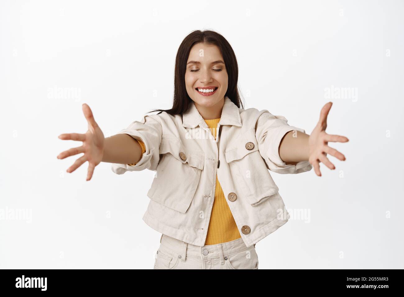 Beautiful romantic woman cuddling, stretch out hands for hug with ...