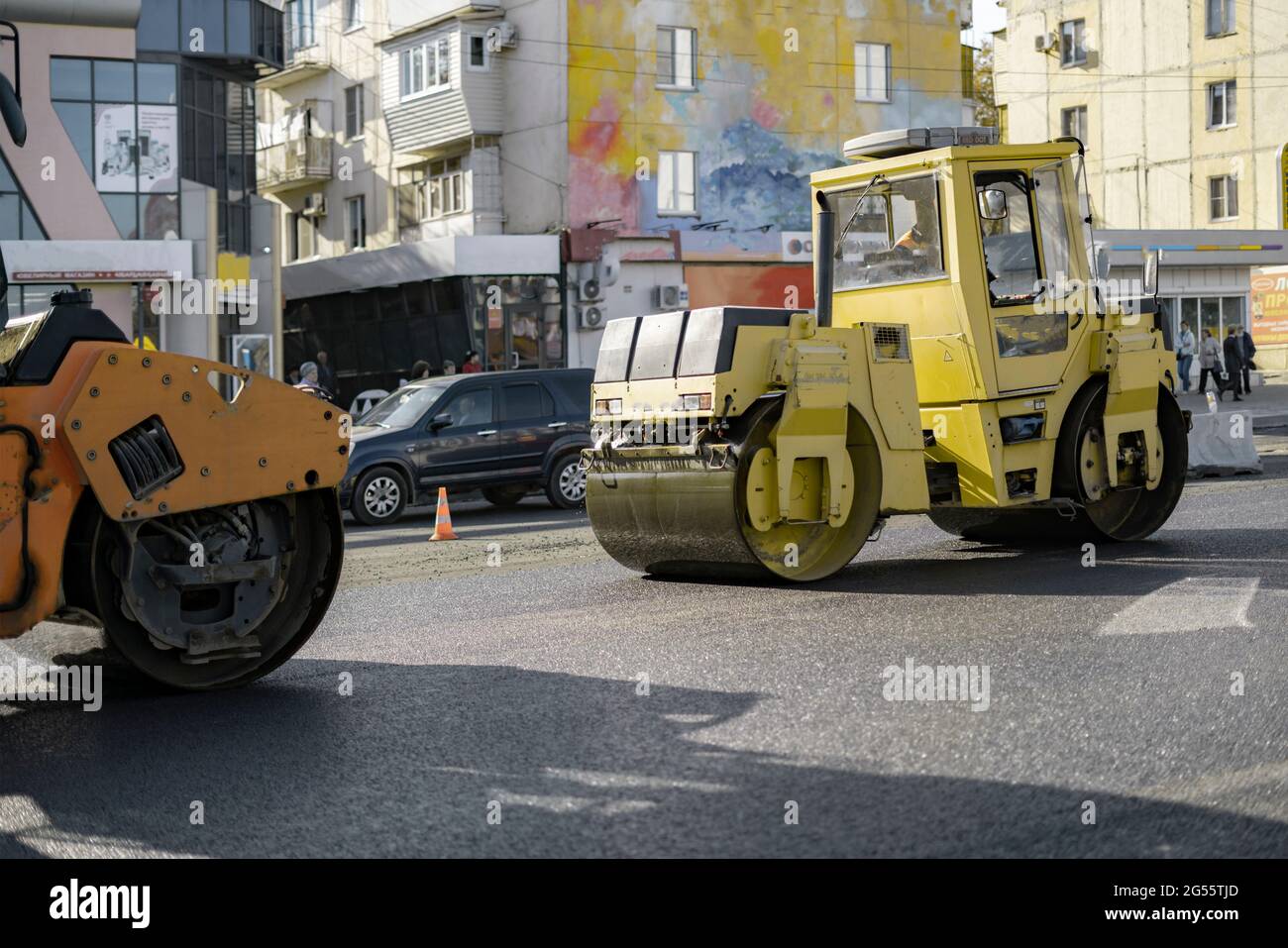 the road repair process, roller vehicle fix the highway in the urban ...