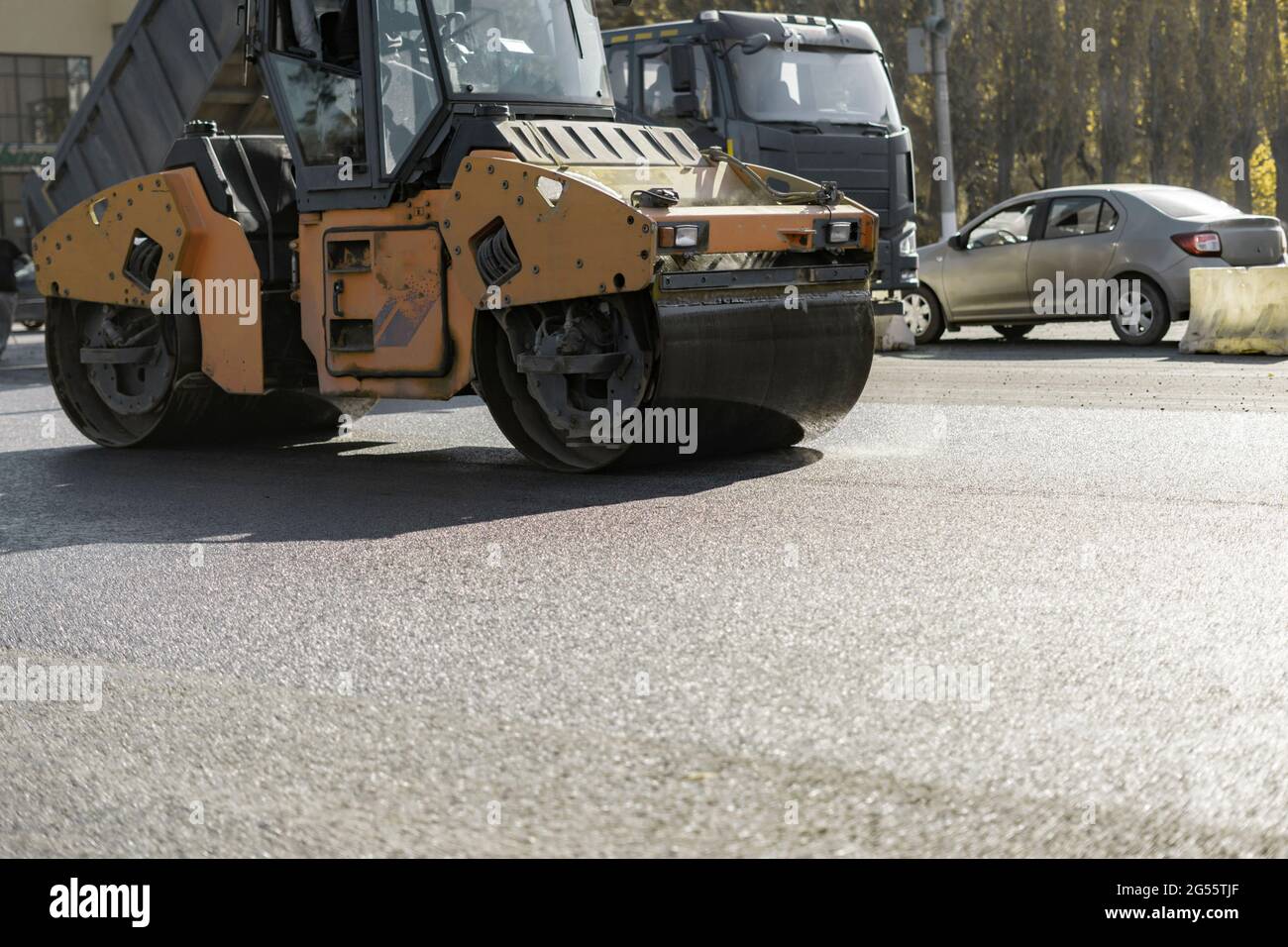 the road repair process, roller vehicle fix the highway in the urban ...