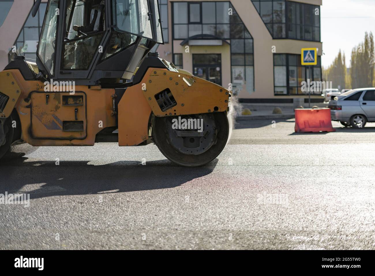 the road repair process, roller vehicle fix the highway in the urban ...