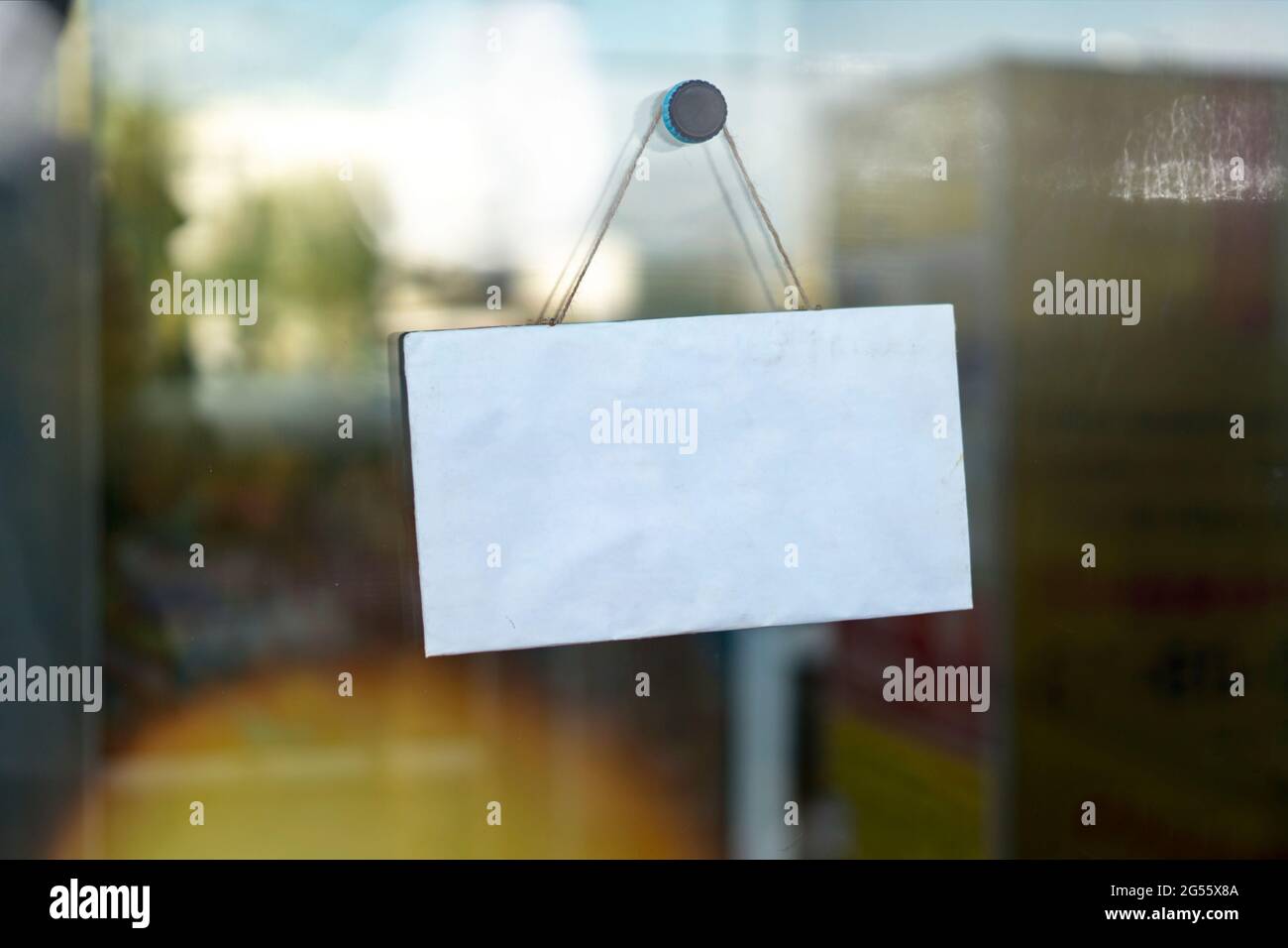 simple sign board frame hanging on the wall of the building exterior ...