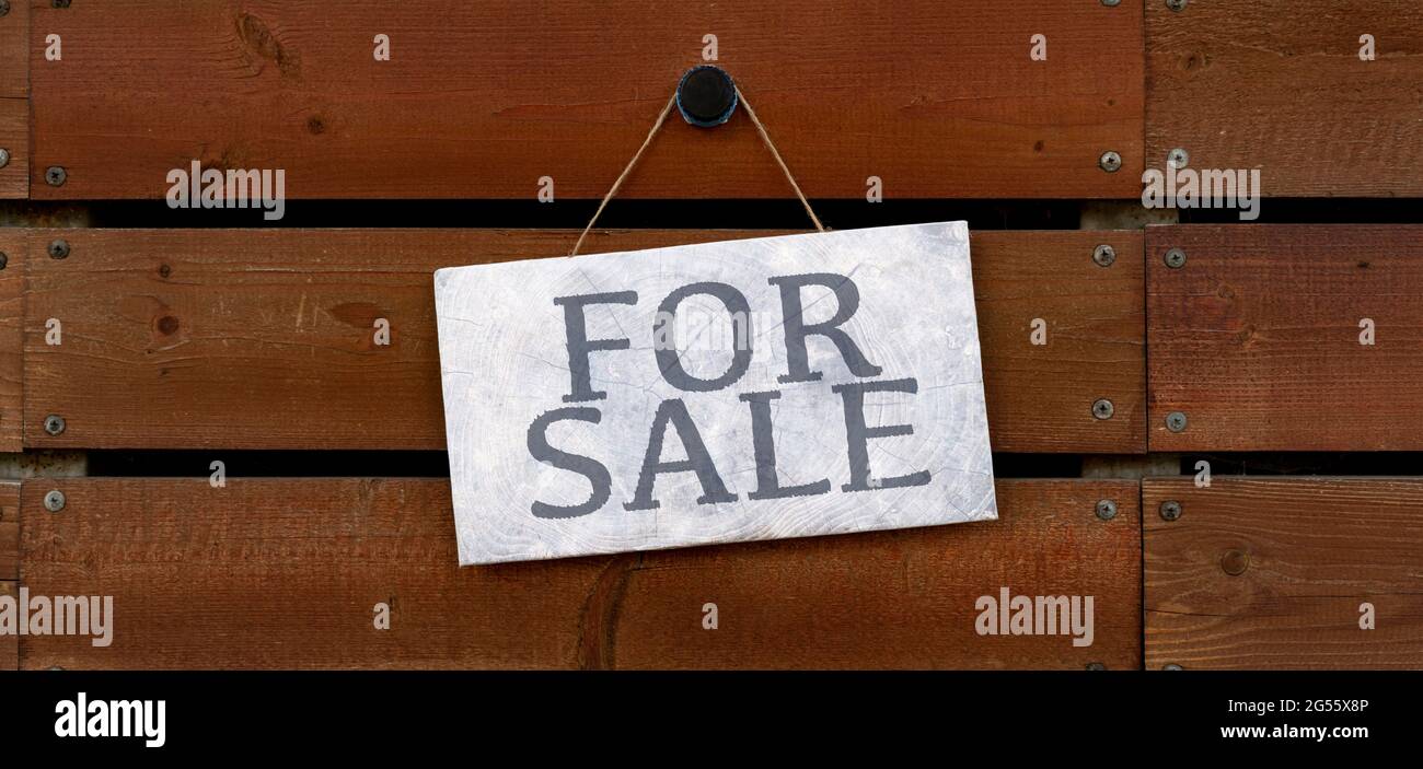 simple sign board frame hanging on the wall of the resident building ...