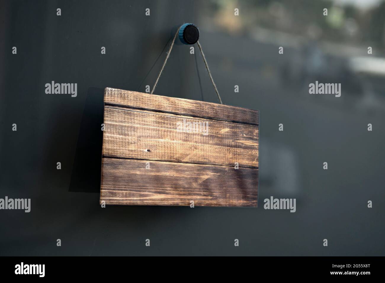 simple sign board frame hanging on the wall of the building exterior ...