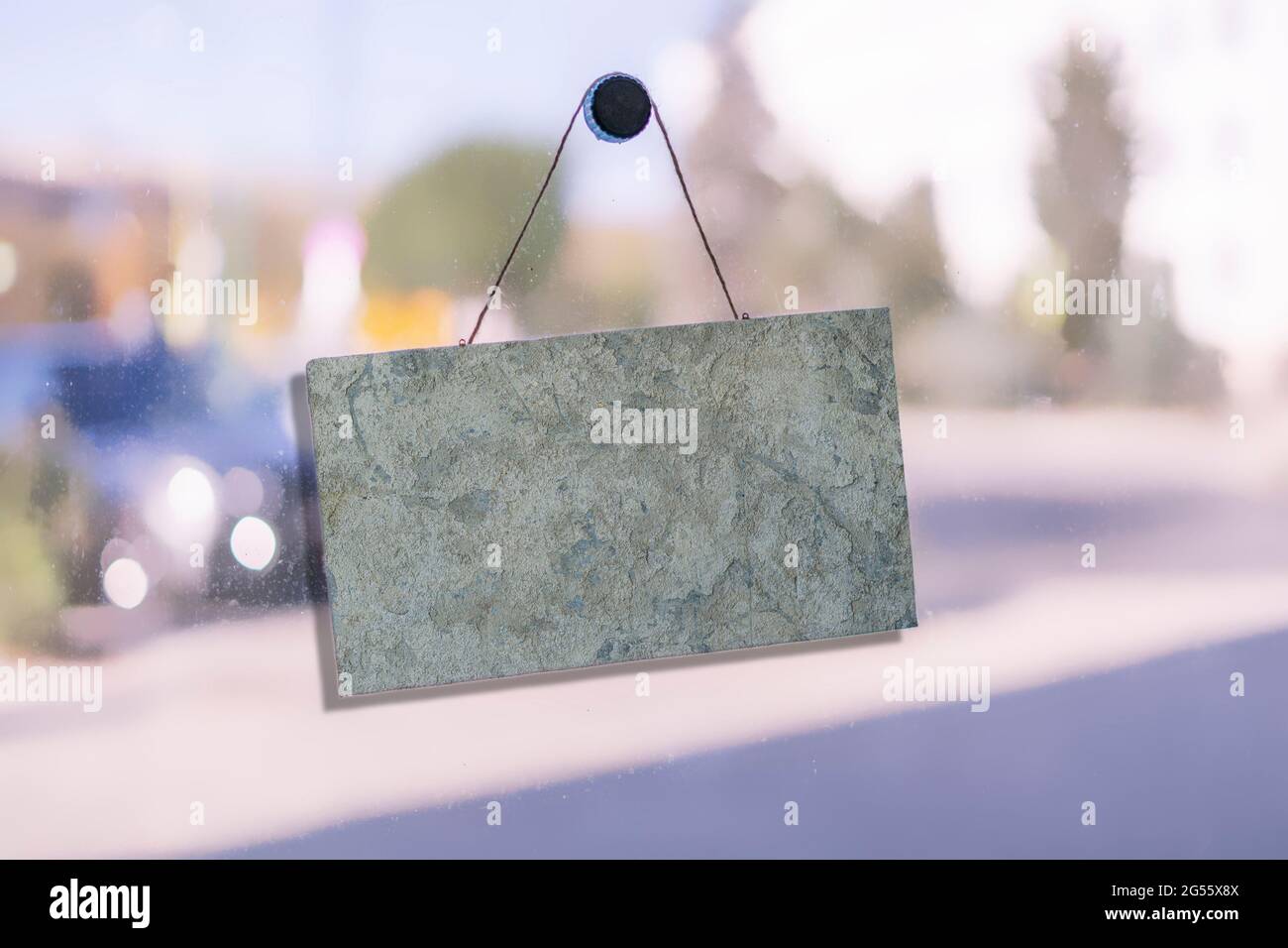 simple sign board frame hanging on the wall of the building exterior ...