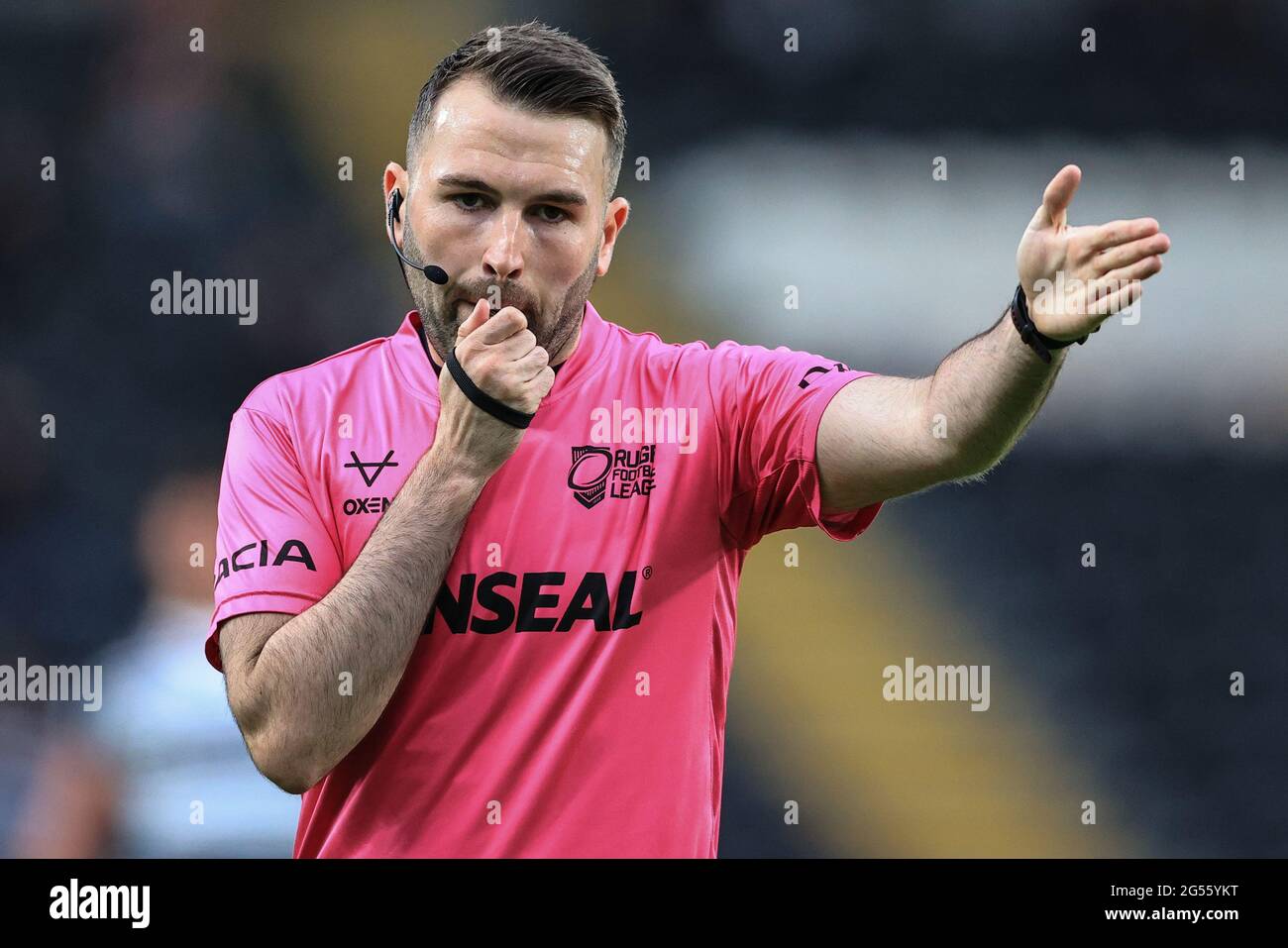 Referee with ball back hi-res stock photography and images - Alamy
