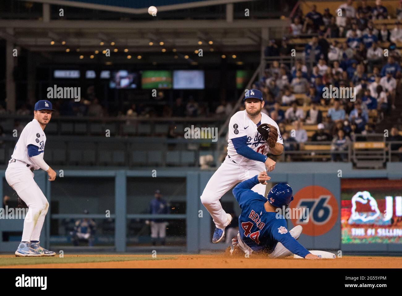 Los Angeles Dodgers first baseman Max Muncy (13) attempts to turn a ...