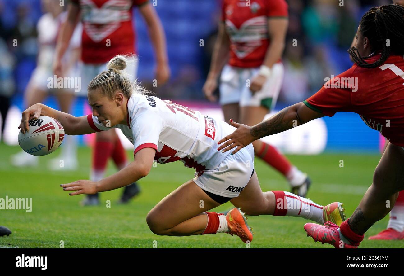 England's Hollie Dodd scores on her debut during the women's ...