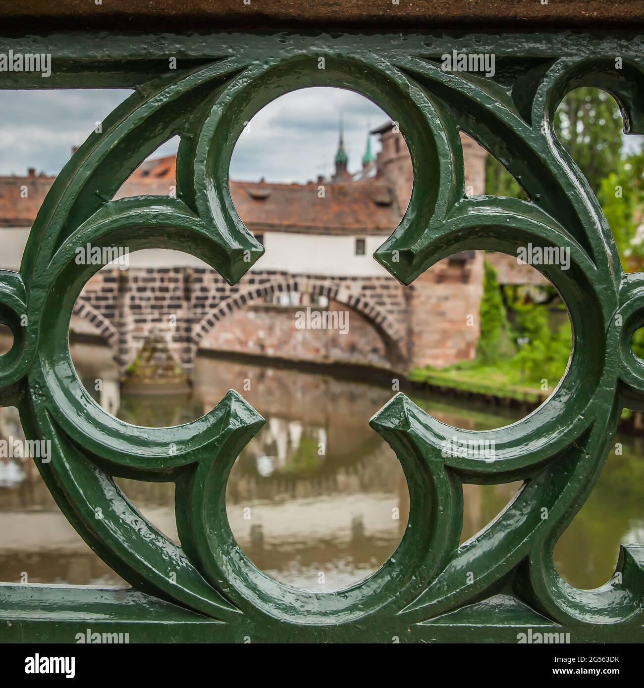 View of Nuremberg in Germany through bridge railing. Architectural ...