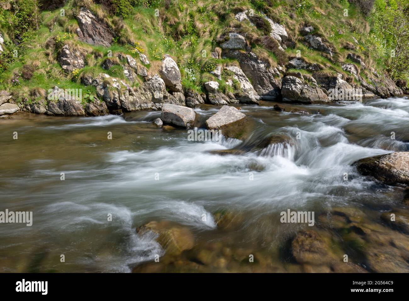 Long exposure of the River Heddon flowing into Heddons Mouth on the ...