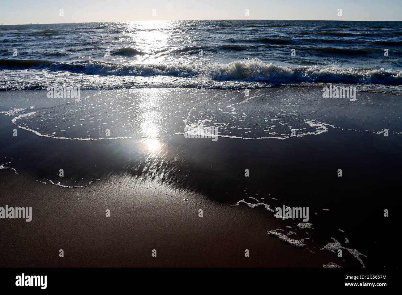Waves in the surf of Katwijk beach in the Netherlands Stock Photo - Alamy