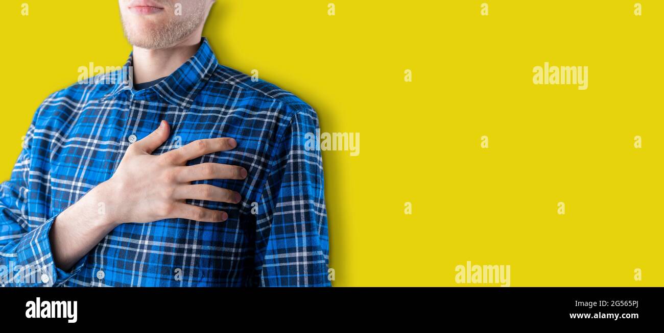 the male person holding his hand to the chest heart, the concept of ...