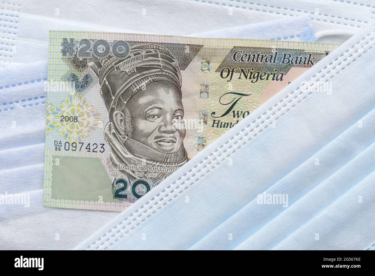 Nigerian naira 200 banknote on medical masks Stock Photo - Alamy