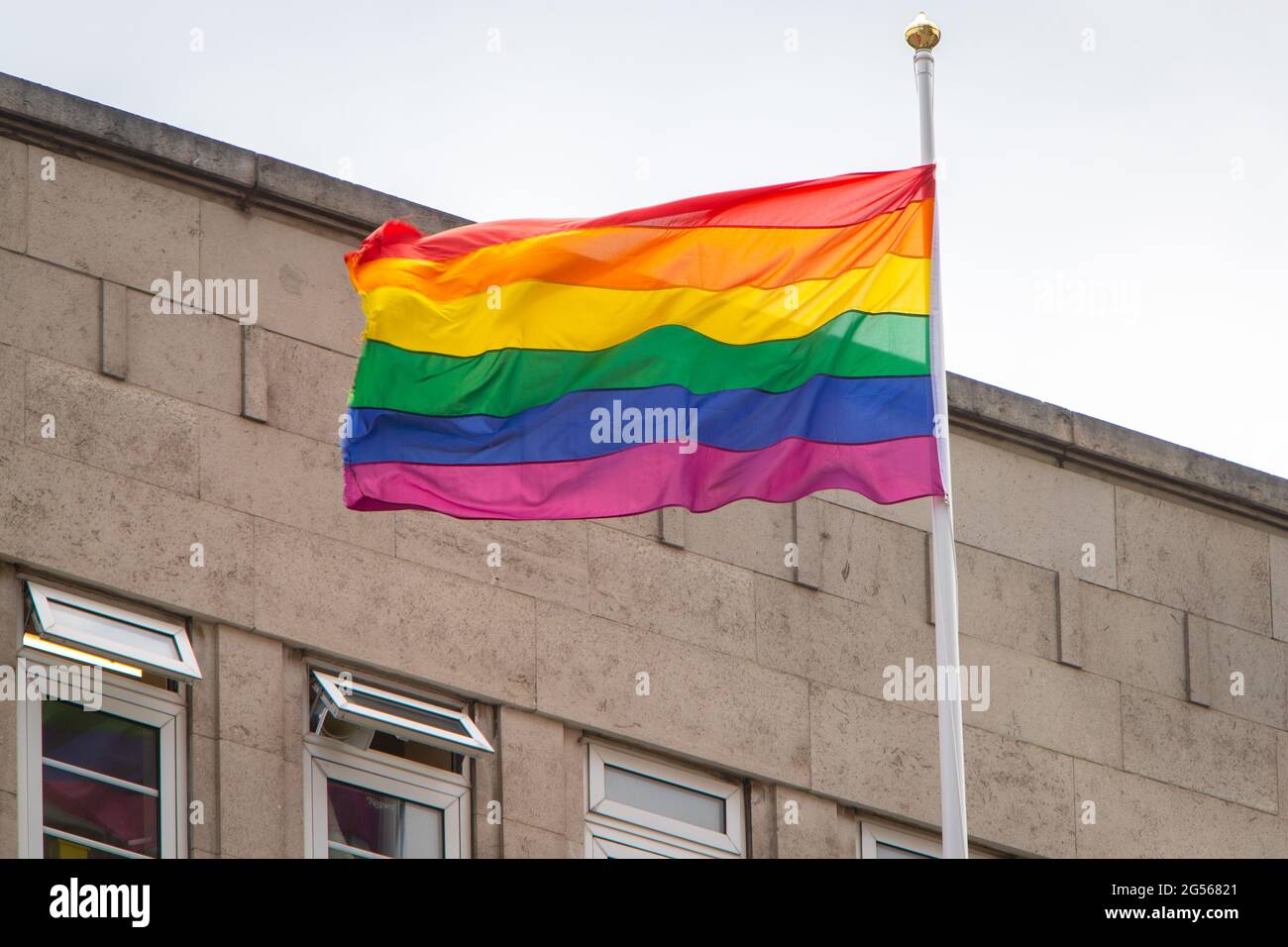 Rainbow flag floating in the wind Stock Photo - Alamy