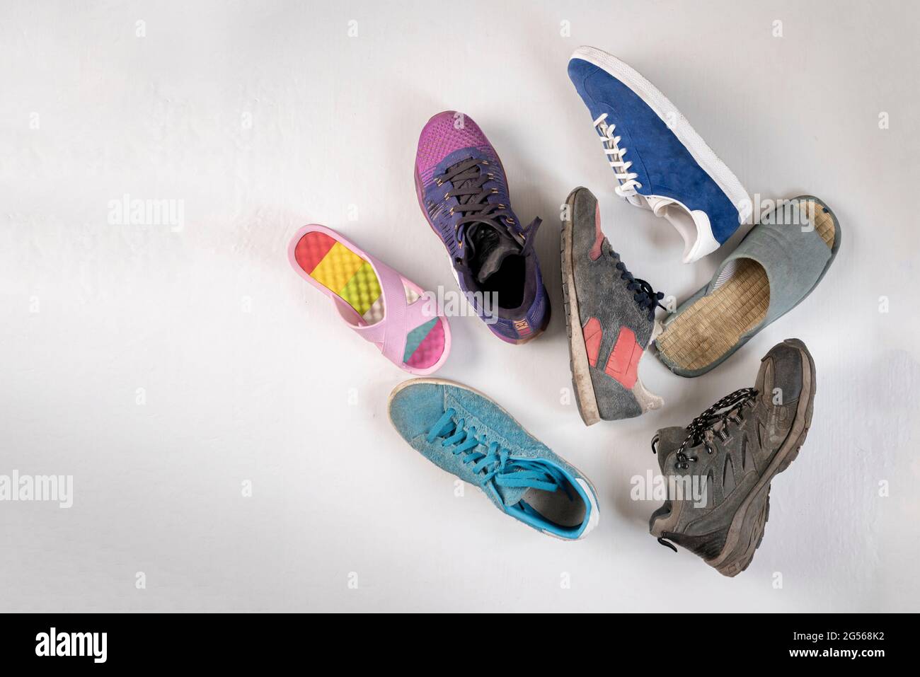 bunch of new and used shoes, mix of differetn models pair on black and ...