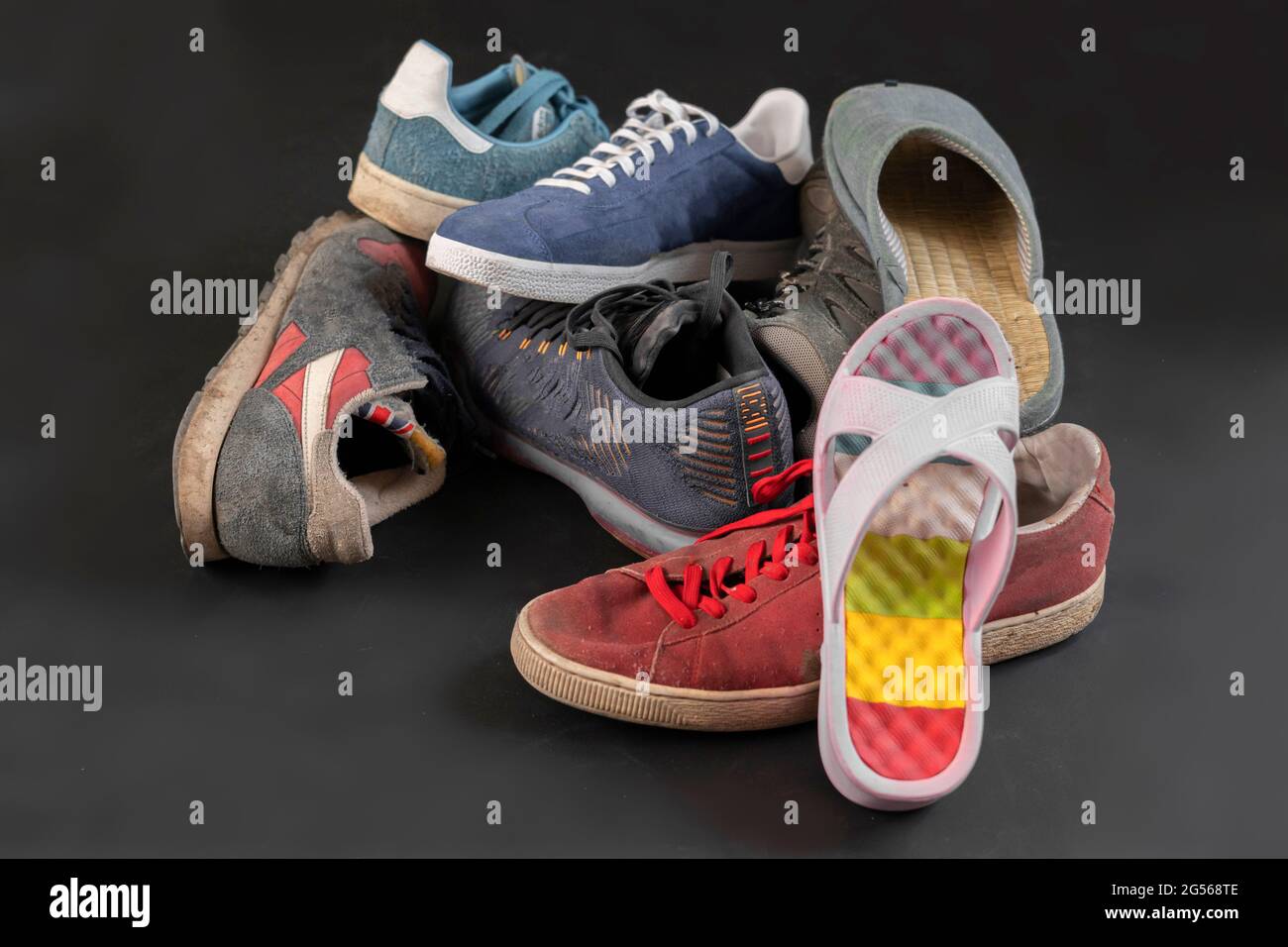 bunch of new and used shoes, mix of differetn models pair on black and ...