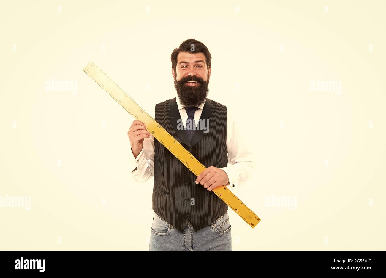 Happy school teacher hold ruler for geometry lesson isolated on white ...