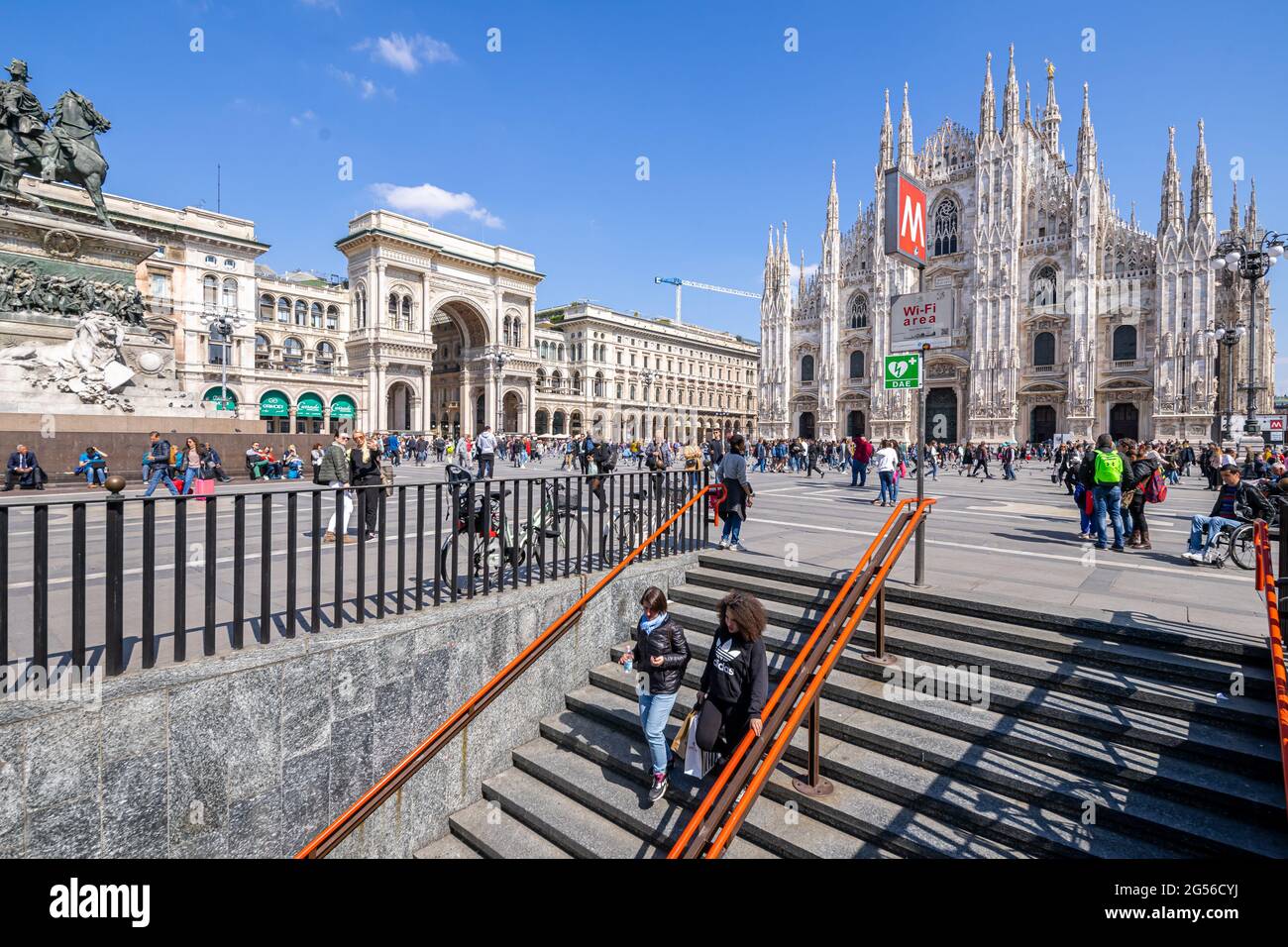 Wide angle view of Duomo Square with facade of the Milan Cathedral and ...