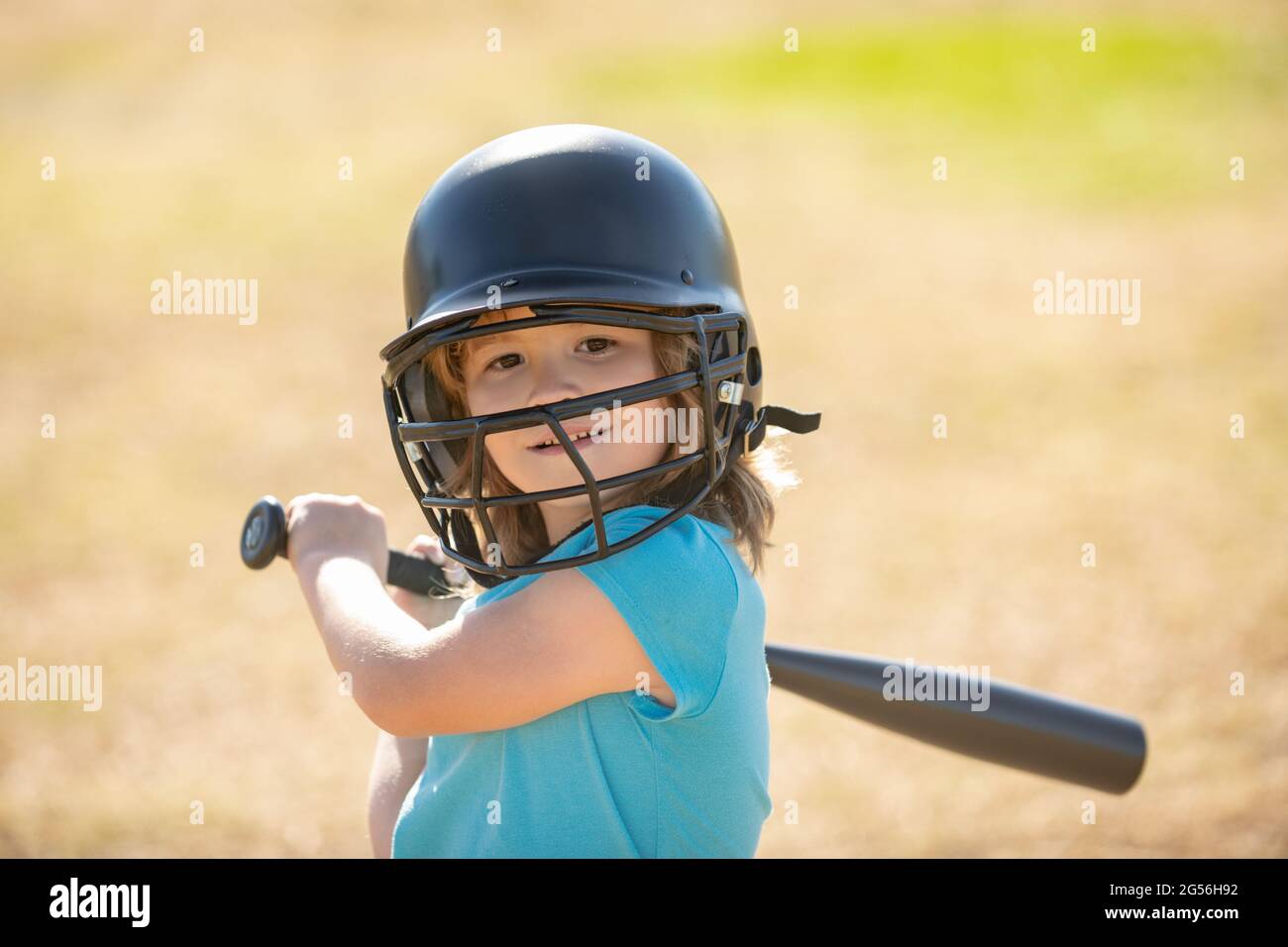 Little boy posing with a baseball bat. Portrait of kid playing baseball ...