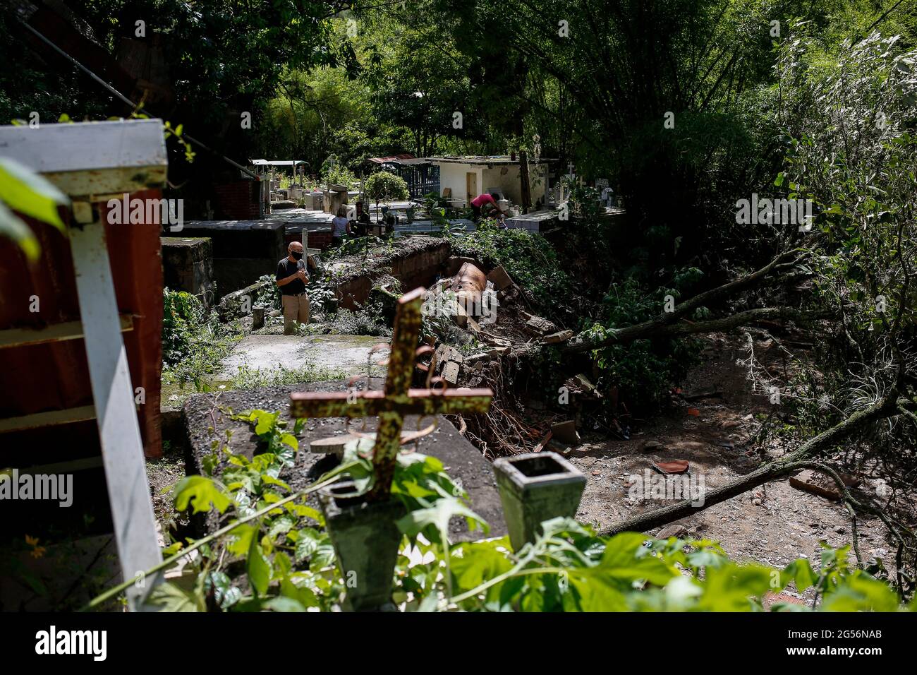 Caracas, Venezuela. 25th June, 2021. A man watches the damage at a ...
