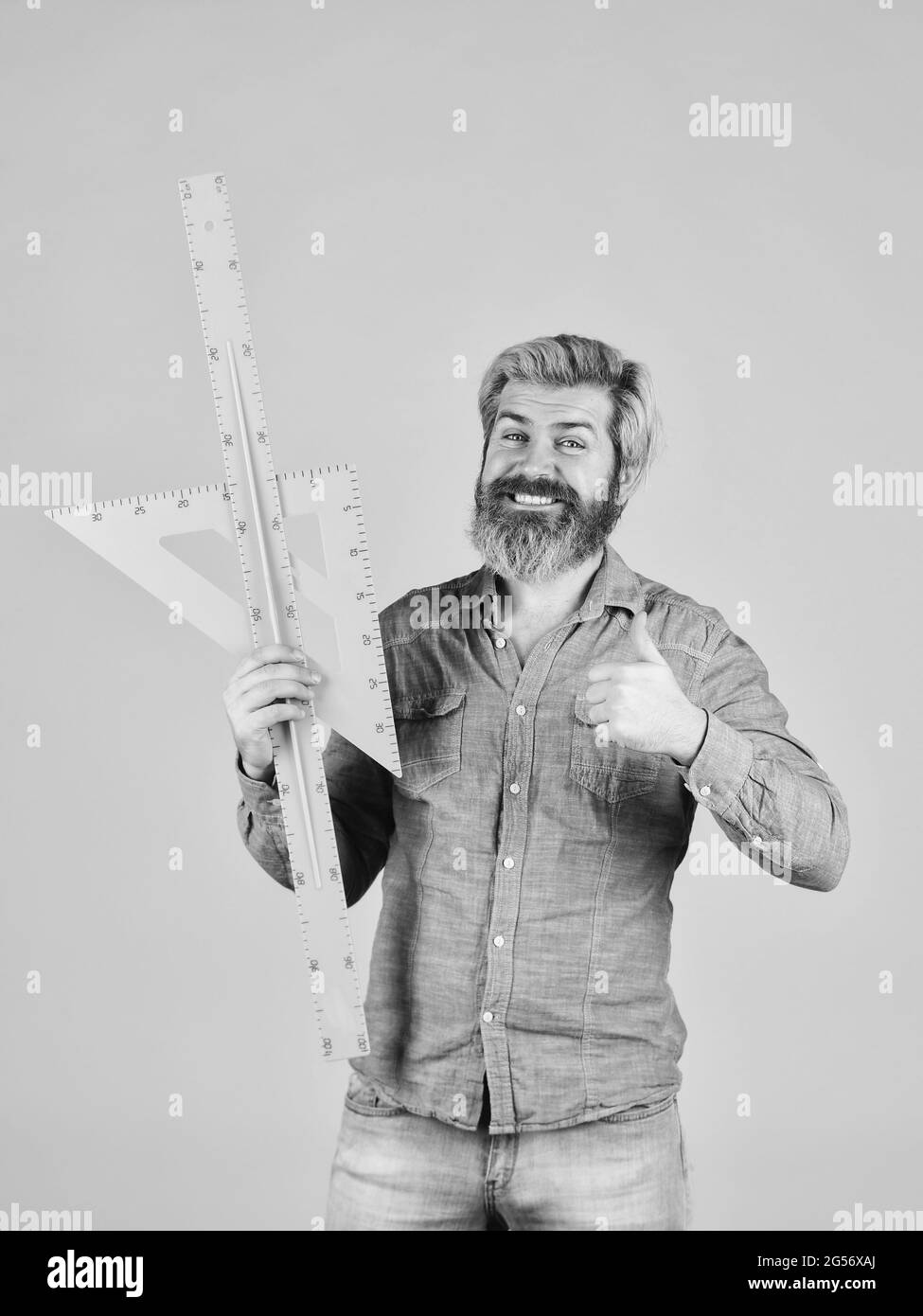 student learning geometry. home learning concept. man teacher use ...