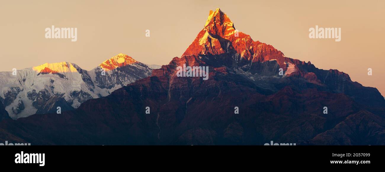 red colored sunset view of mount Machhapuchhre, Annapurna area, Nepal ...