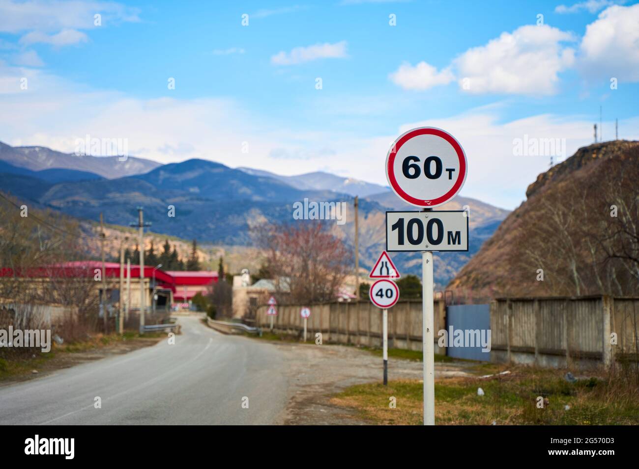 Car road sign on a mountain road Stock Photo - Alamy