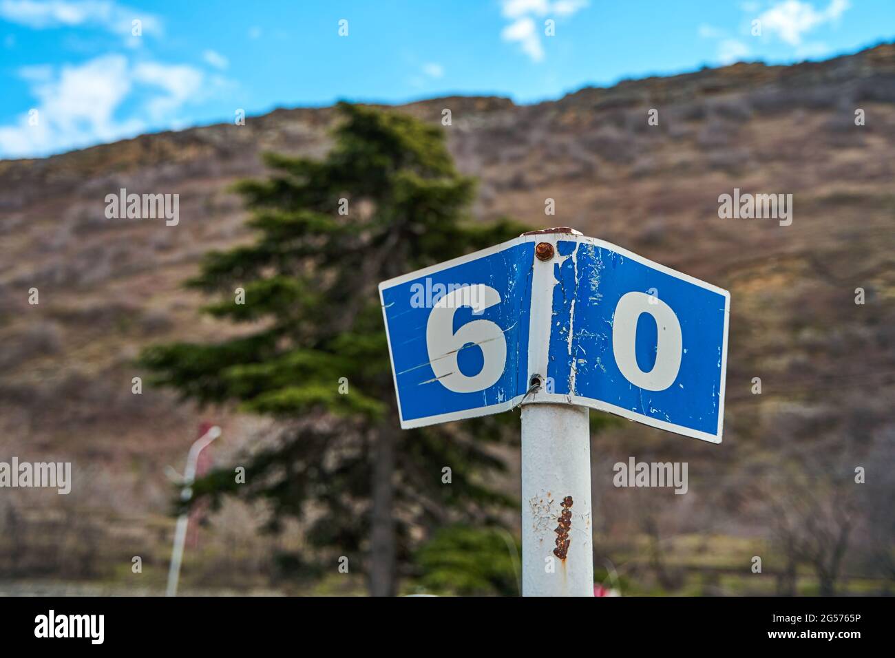 Car road sign on a mountain road Stock Photo - Alamy