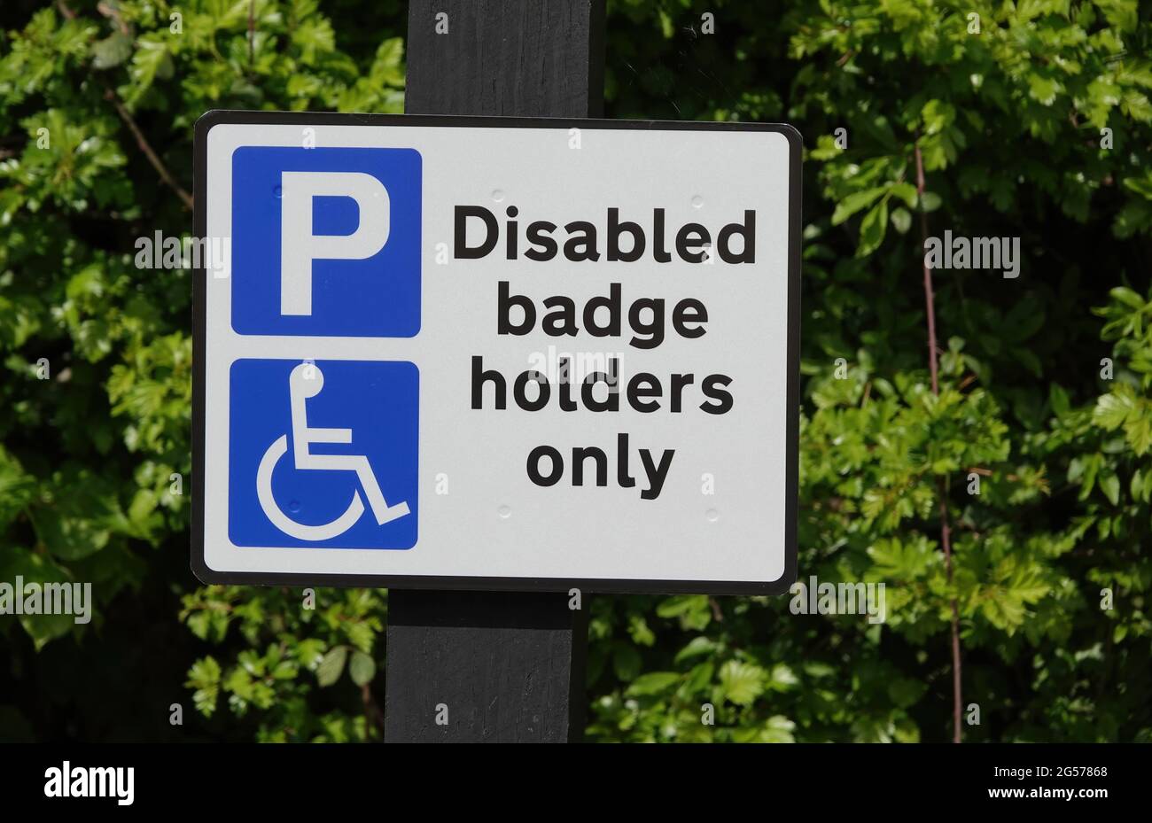 Traffic sign displaying the message “disabled badge holders only” Stock ...