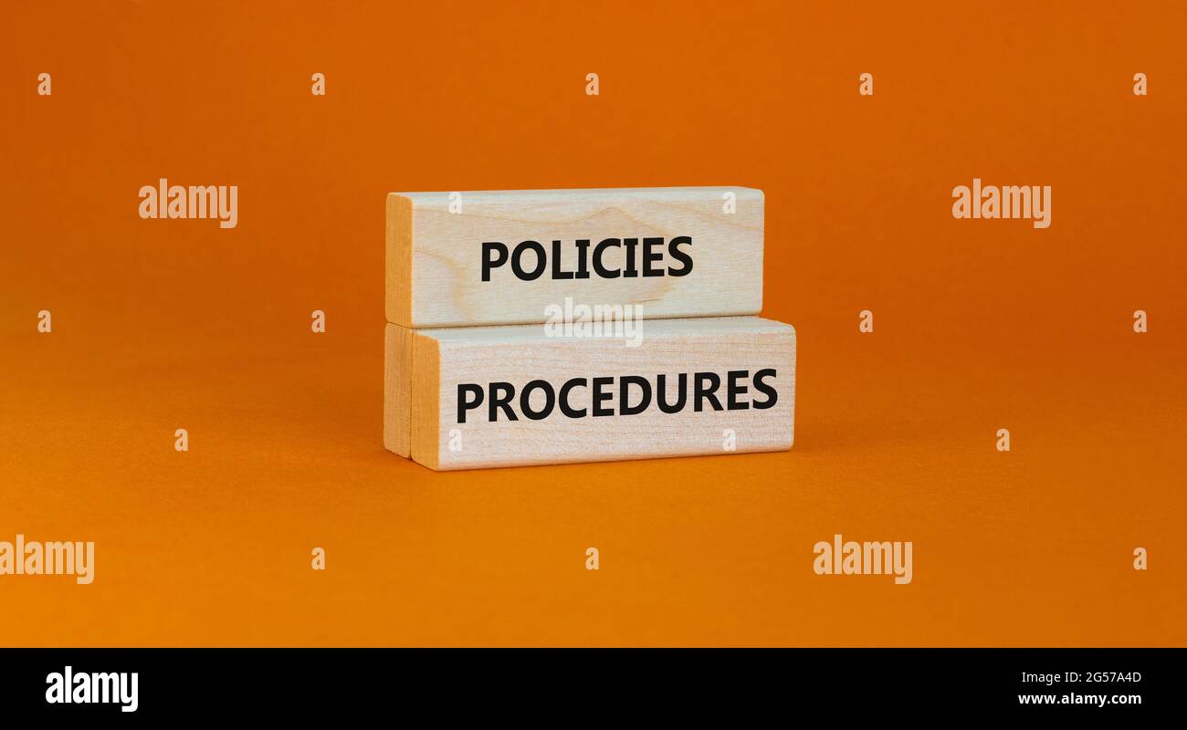 Policies and procedures symbol. Wooden blocks with concept words ... Policies and procedures symbol. Wooden blocks with concept words ...