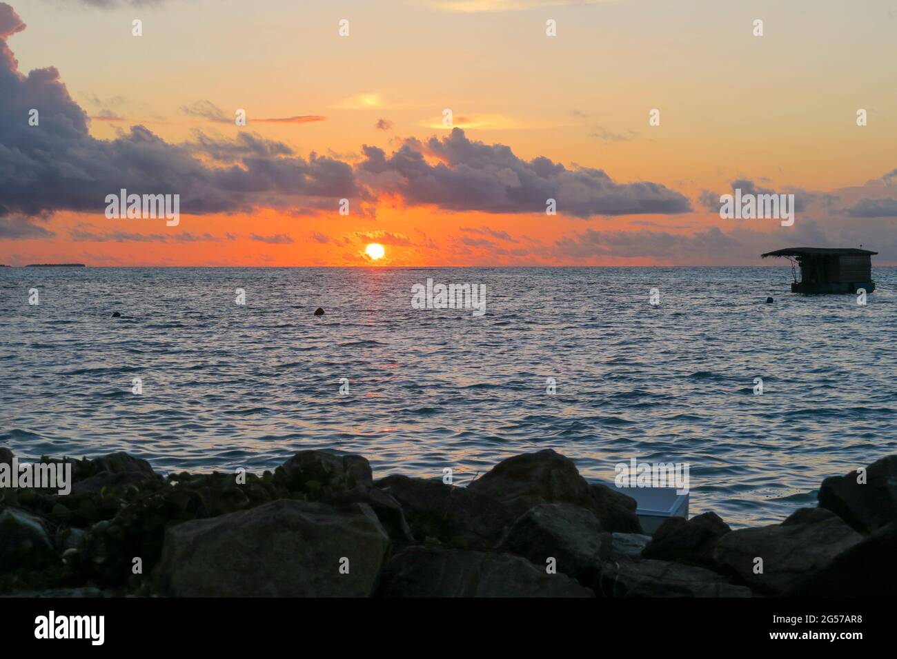 Sunset over the beach, South Ari Atoll, Maldives Stock Photo - Alamy