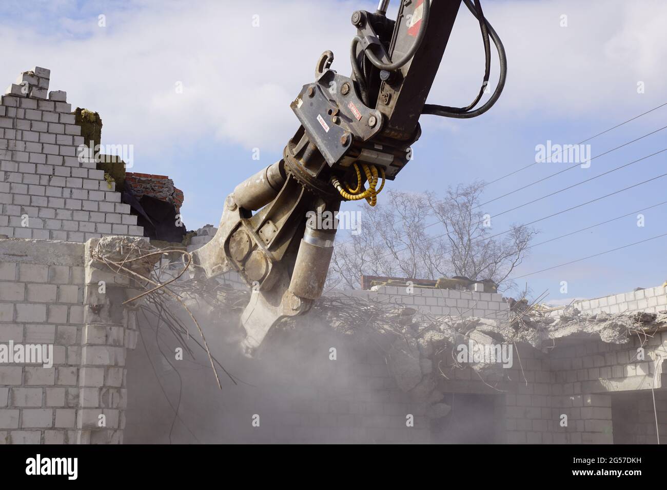 Tractor doing demolition work Stock Photo - Alamy
