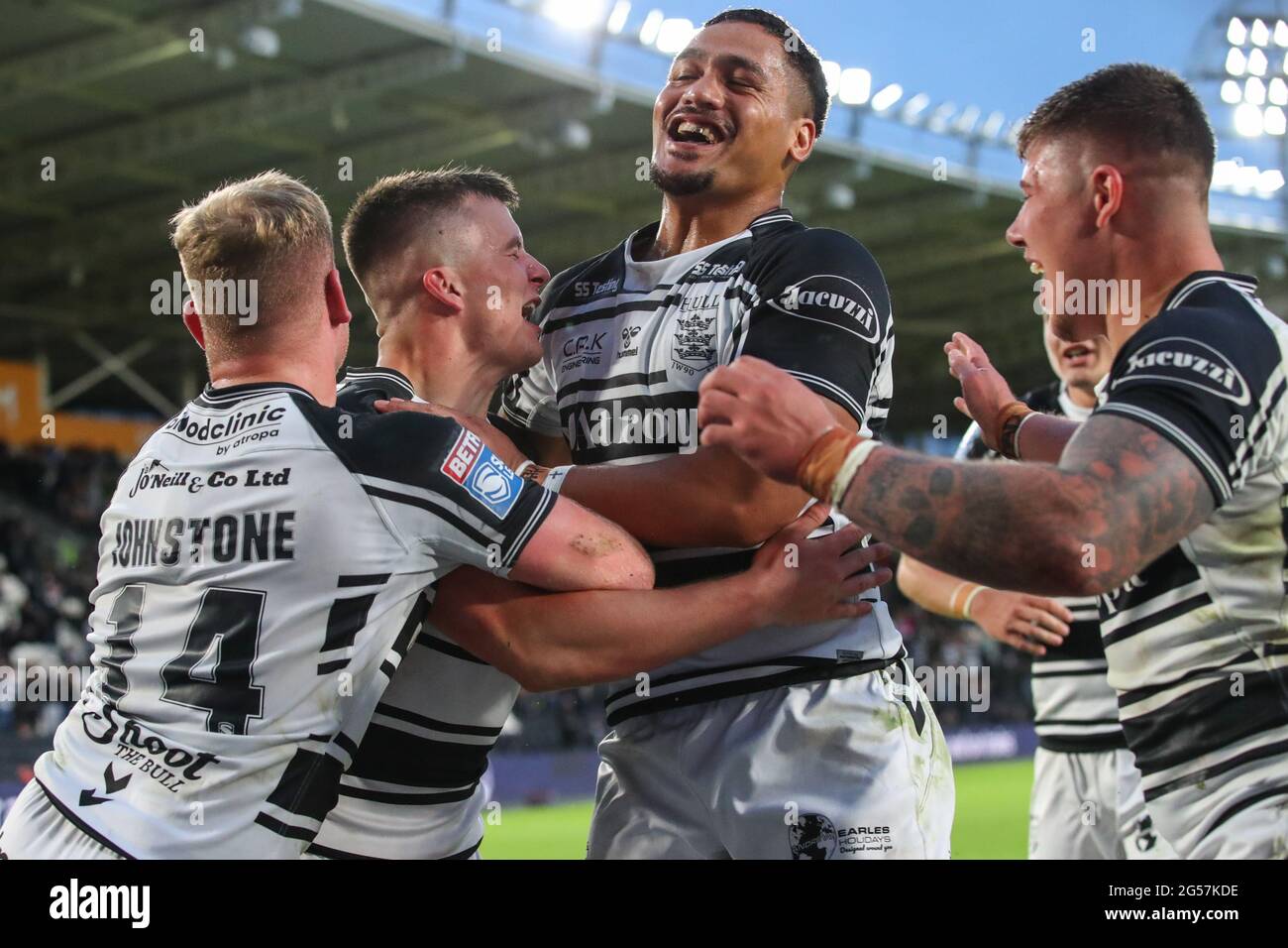 Connor Wynne (23) of Hull FC celebrates his try with team mates Stock ...