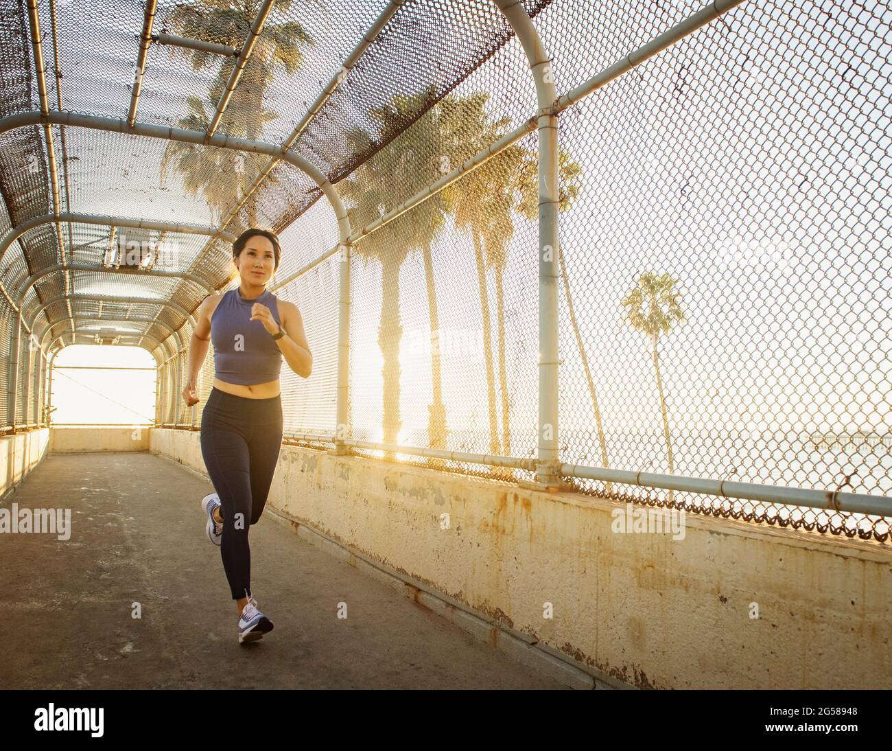 Woman jogging near beach hi-res stock photography and images - Alamy