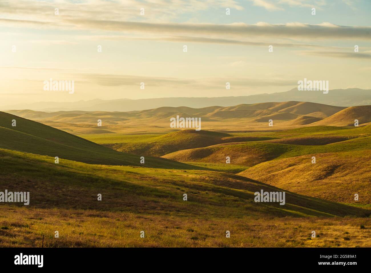 Hilly landscape at sunset hi-res stock photography and images - Alamy