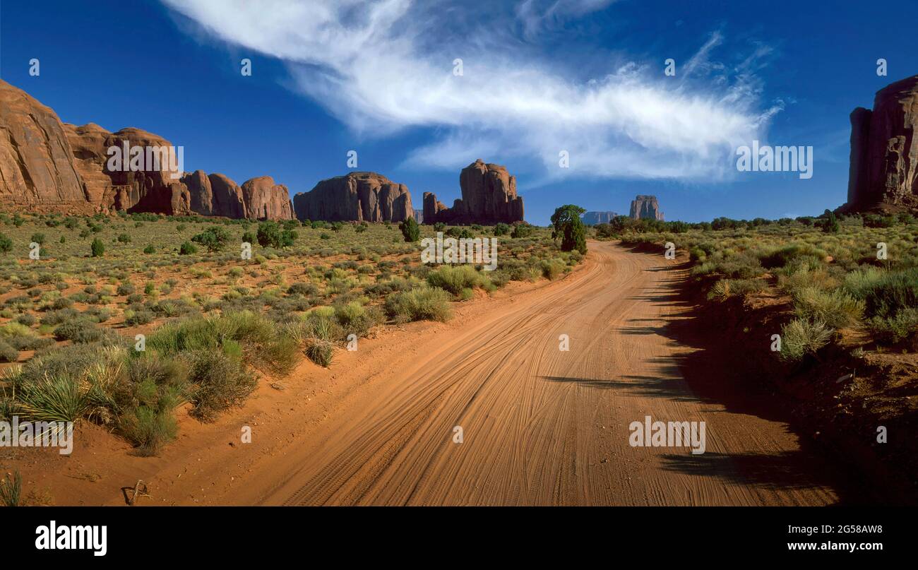 Arizona, Monument Valley Tribal Park, Empty dirt road in desert in ...