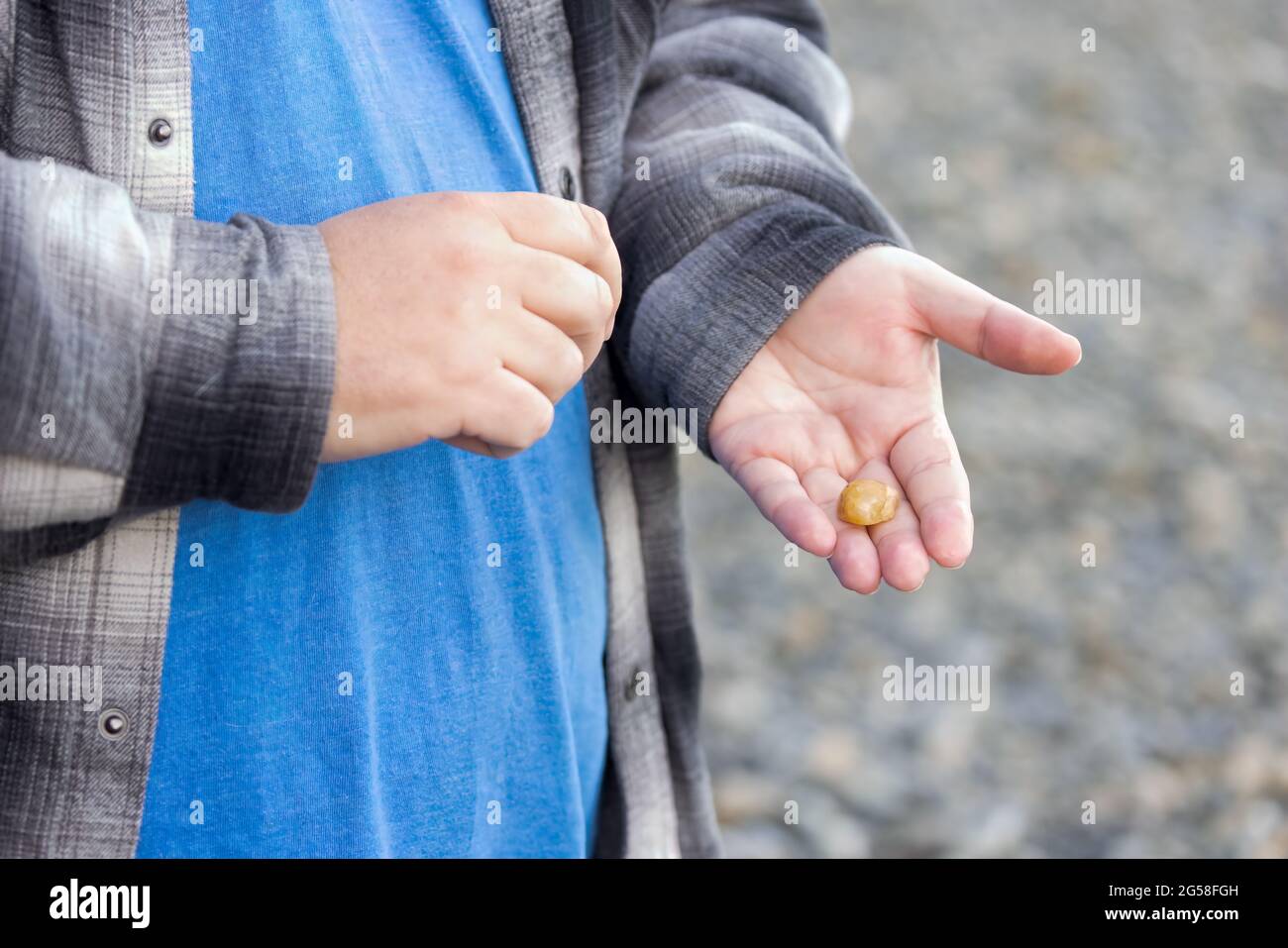 Man with crystal mineral stone hi-res stock photography and images - Alamy