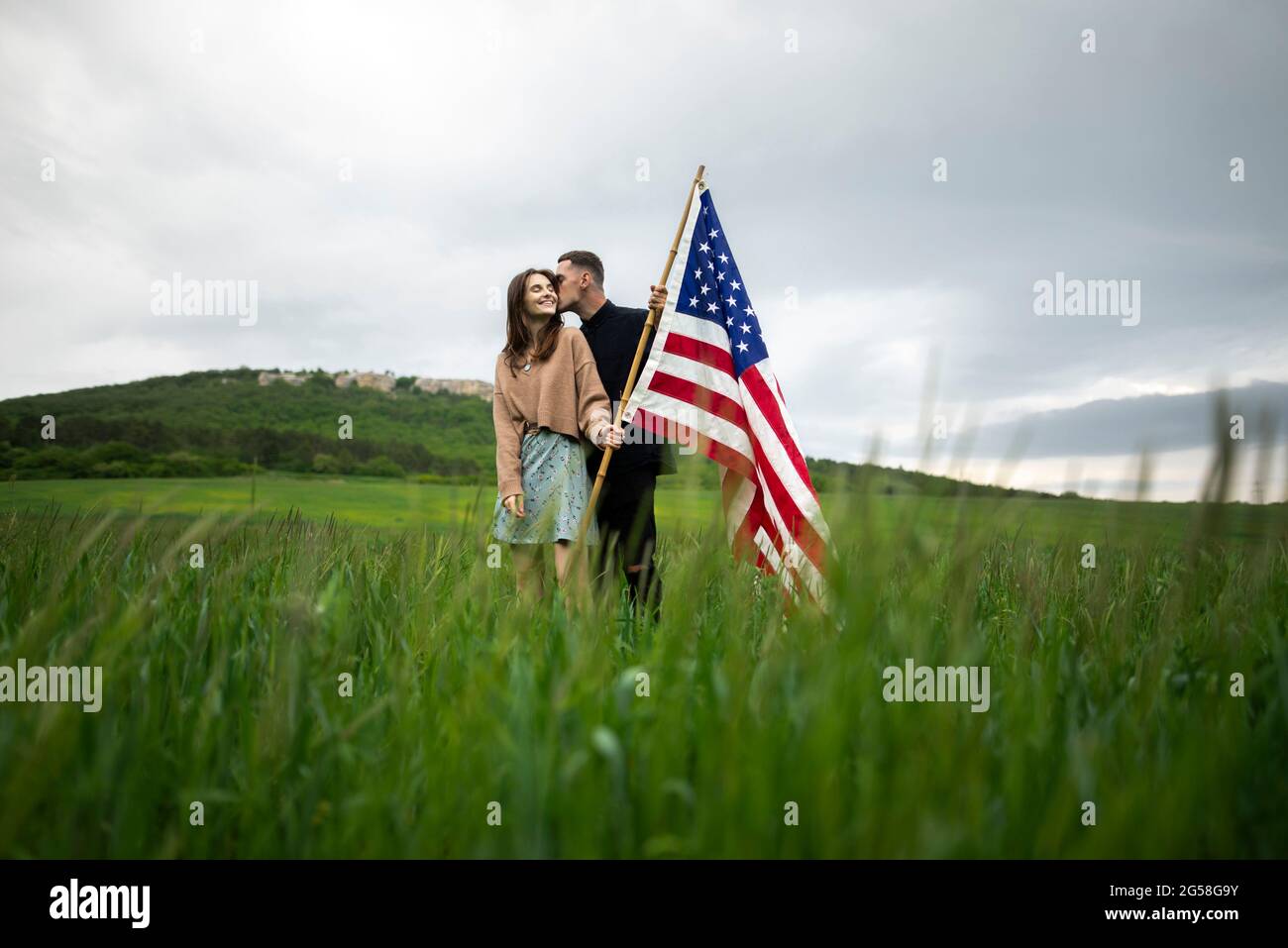 Flag kissing hi-res stock photography and images - Alamy