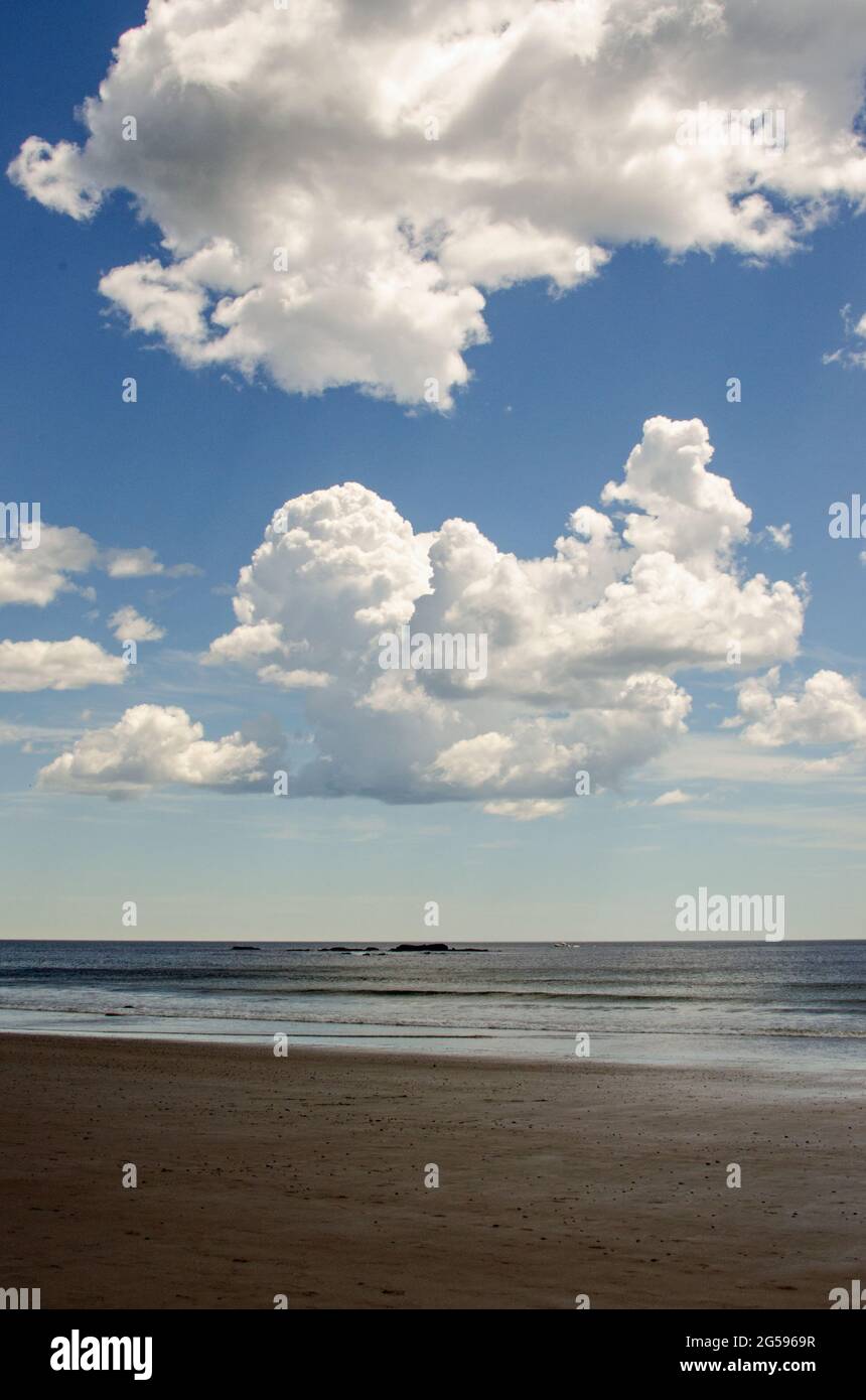 Sandy beach with clouds Stock Photo - Alamy