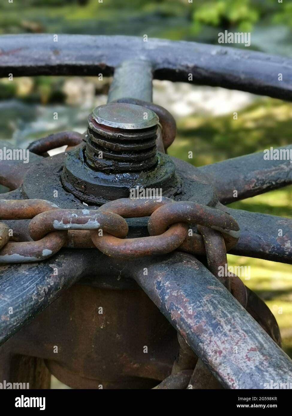 Vertical shot of valve wheel and rusty stem Stock Photo - Alamy