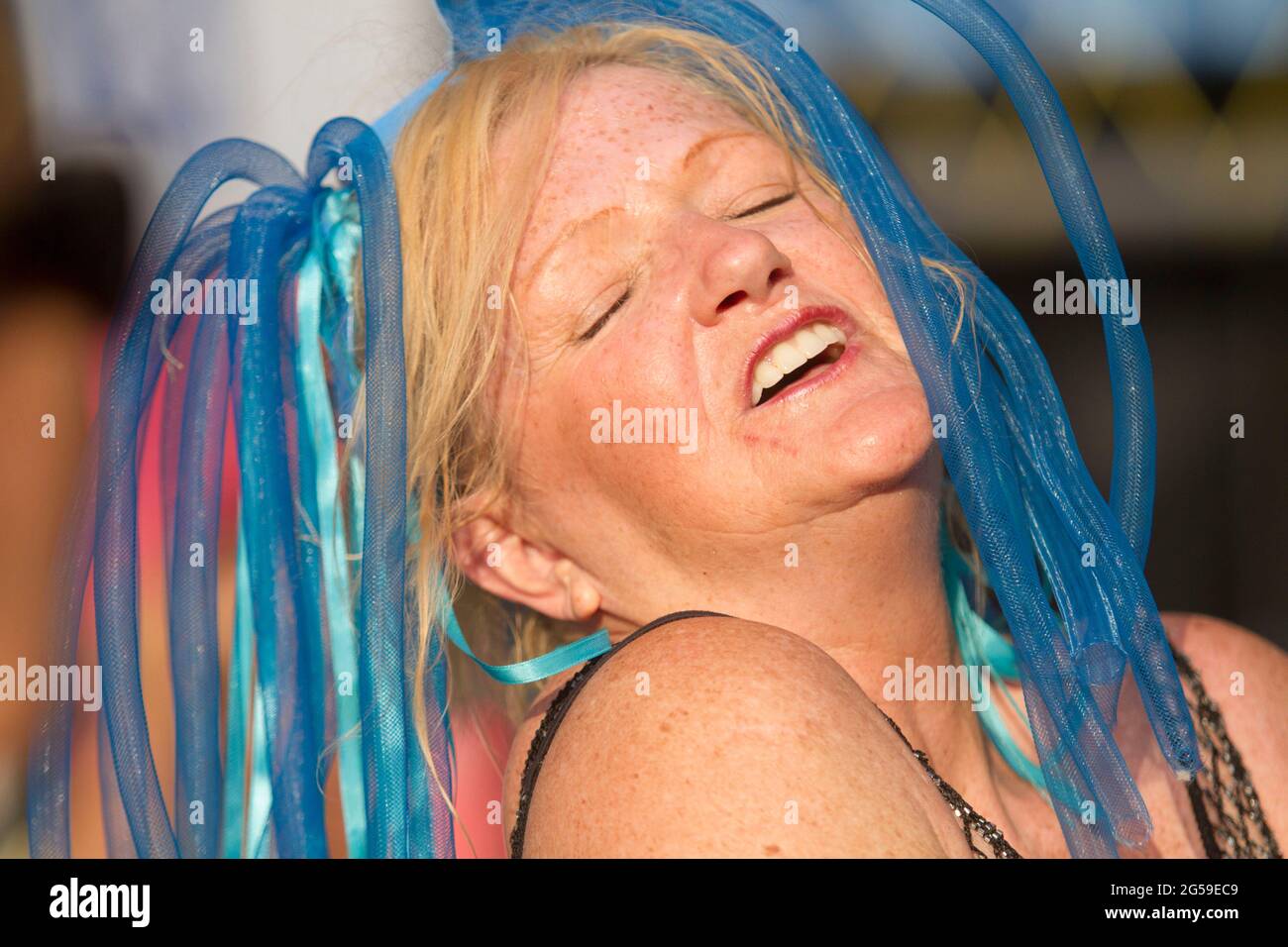 portrait of an elder woman dancing during montreal pride festival Stock ...