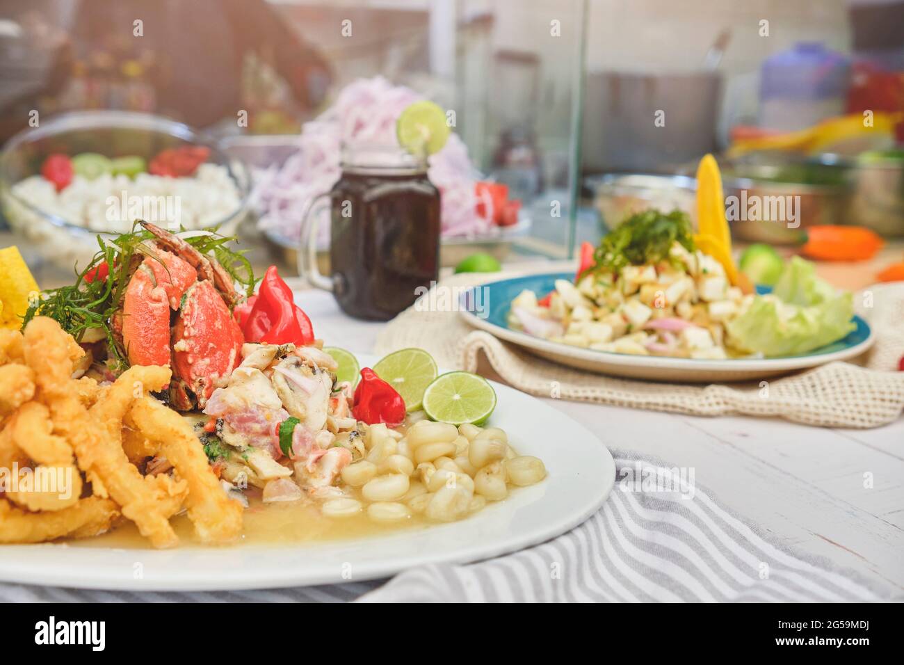 Typical Peruvian food, squid ceviche, shrimp, crab and white fish with ...
