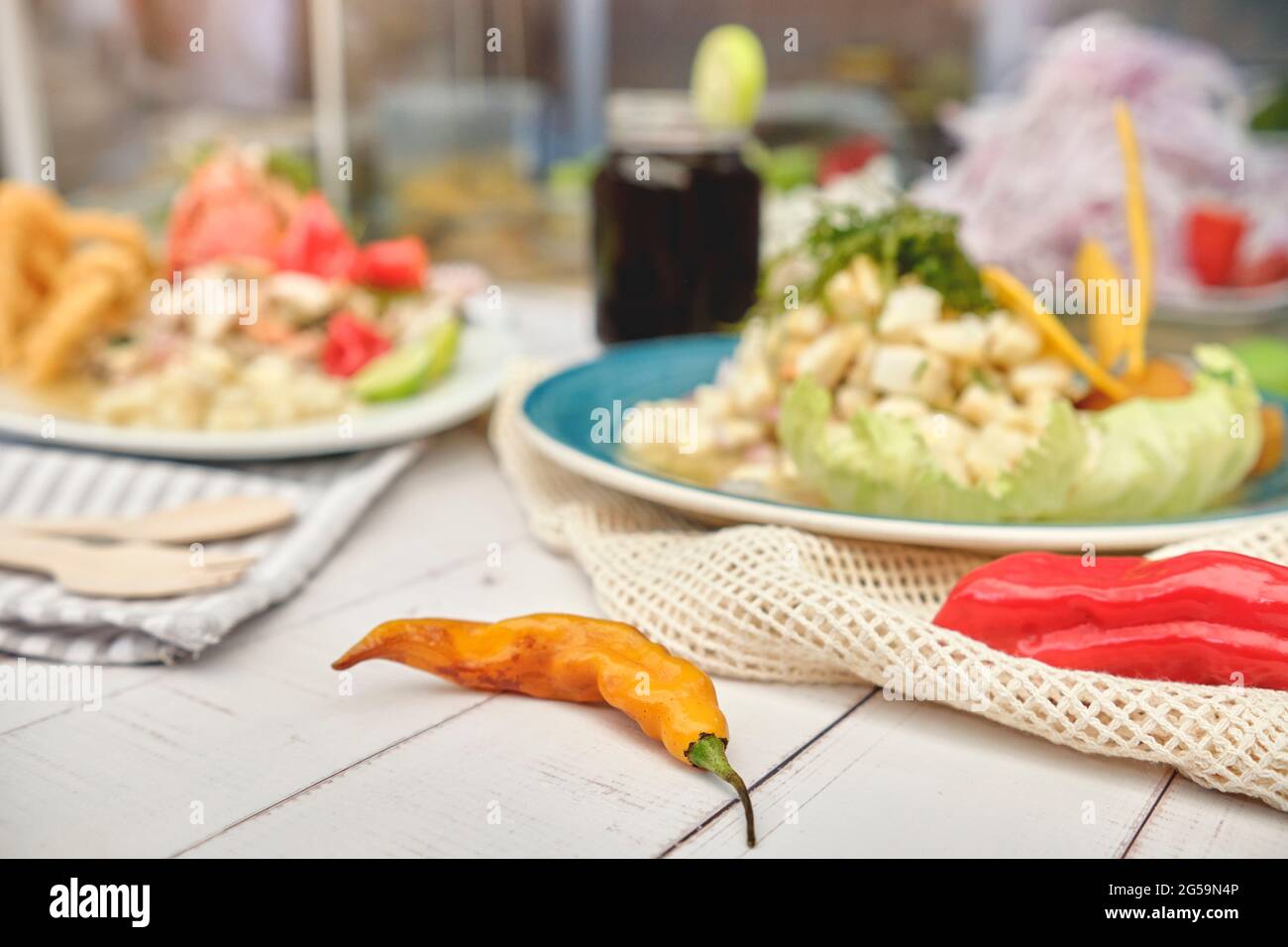 Typical Peruvian food, squid ceviche, shrimp, crab and white fish with ...