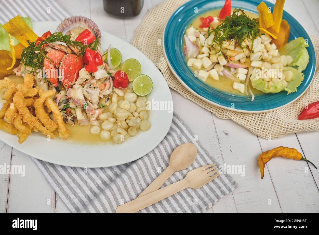 Typical Peruvian food, squid ceviche, shrimp, crab and white fish with ...