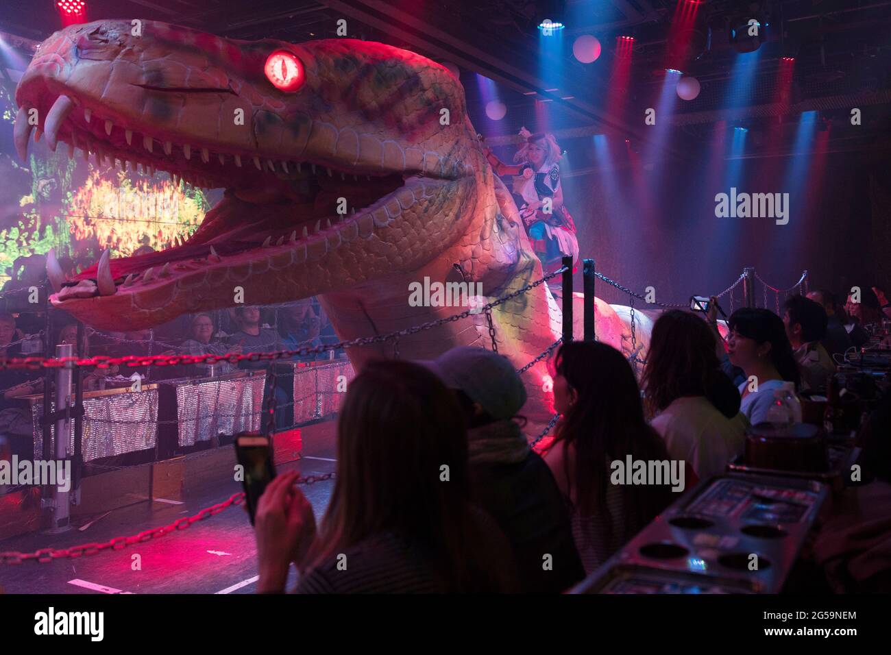 A performer on a giant robot at a show in The Robot Restaurant in Tokyo ...